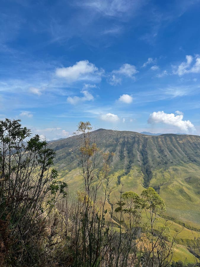 Stunning Panorama of Bromo Tengger Semeru Mountain Range Under a Bright ...