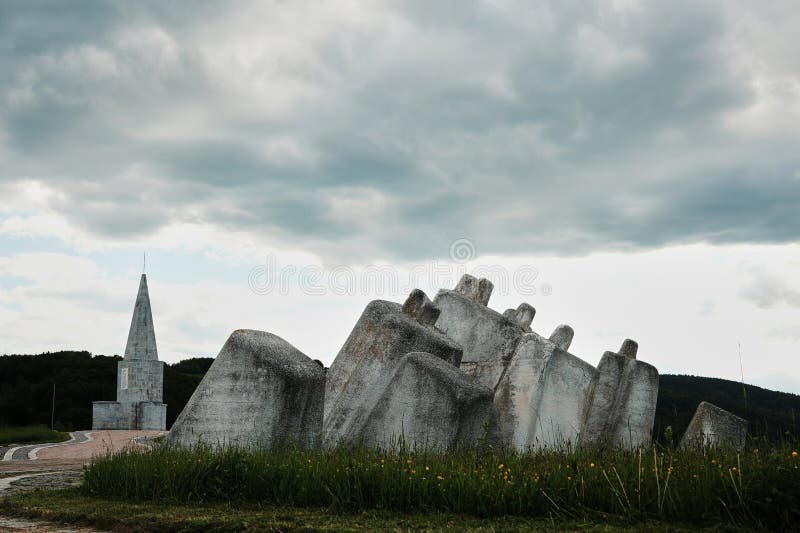 A Stunning Pathway Lined with Abstract Concrete Figures Symbolizes ...