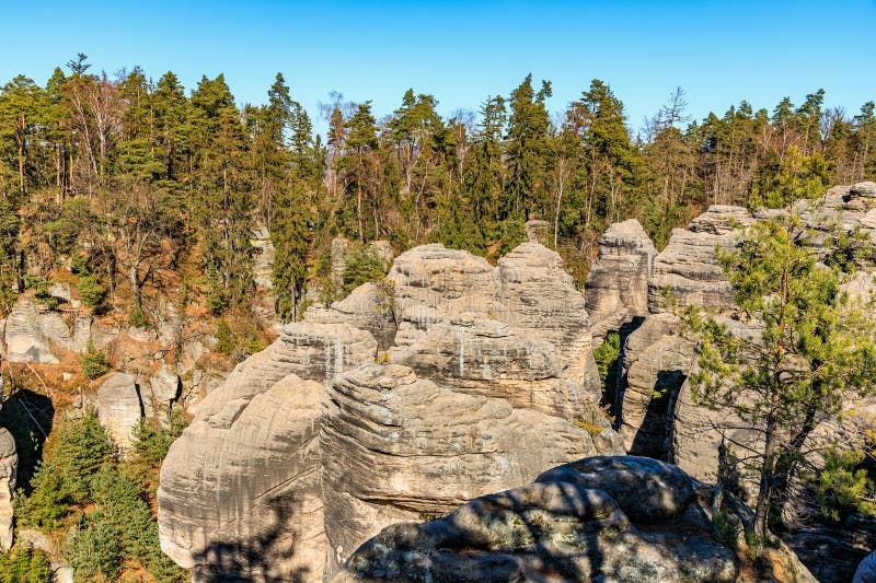 Stunning Rocky Sandstone Formations and Lush Forest Under Clear Blue ...
