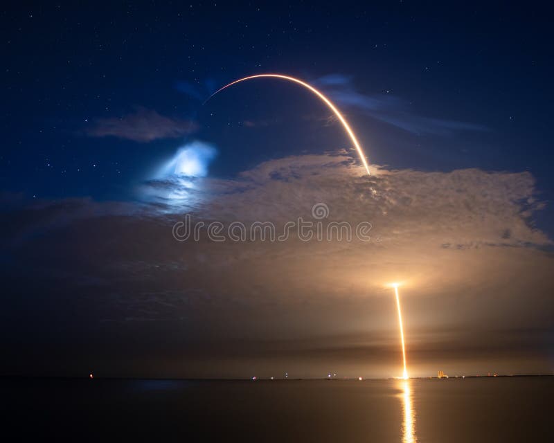 A Rocket Launch Streaks into a Starry Night Stock Photo - Image of ...