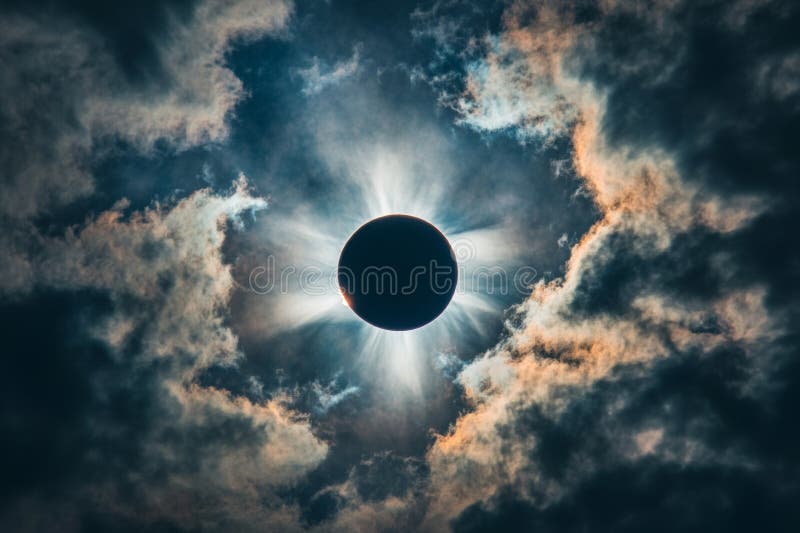 A Stunning Solar Eclipse Creates a Dramatic Halo Effect Over Clouds ...