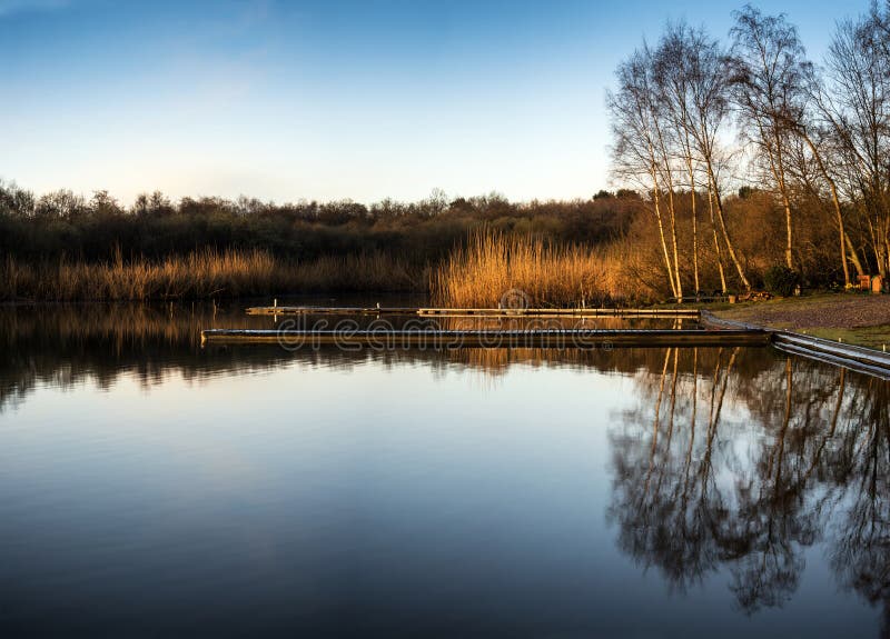Stunning Spring Sunrise Landscape Over Lake with Reflections and Stock ...