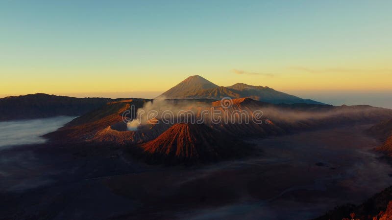 A Stunning Sunrise at Mount Bromo Reveals a Vibrant Sunset Stock ...