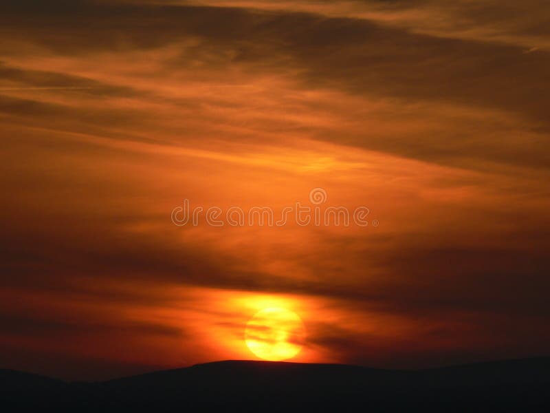 Stunning Sunset through the Clouds Stock Photo - Image of orange, fine ...