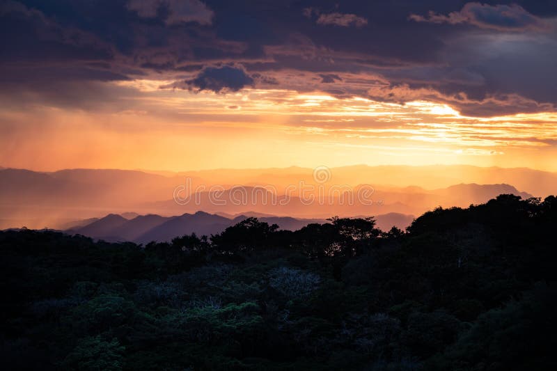 Stunning Sunset Illuminates the Landscape of a Misty Mountain Range ...