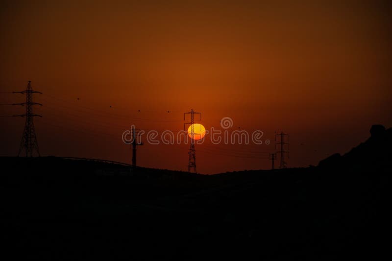 Stunning Sunset Illuminating a Vast Array of Power Towers and ...