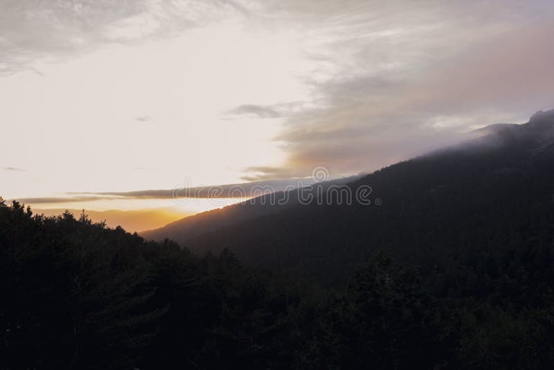 Stunning Sunset between Mountains Stock Image - Image of scene, horizon ...