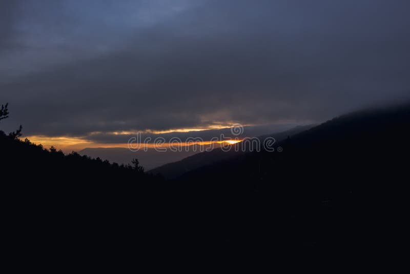 Stunning Sunset between Mountains Stock Photo - Image of blue ...