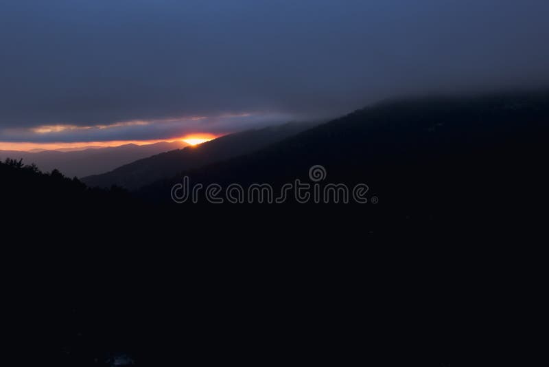 Stunning Sunset between Mountains Stock Photo - Image of heaven, land ...