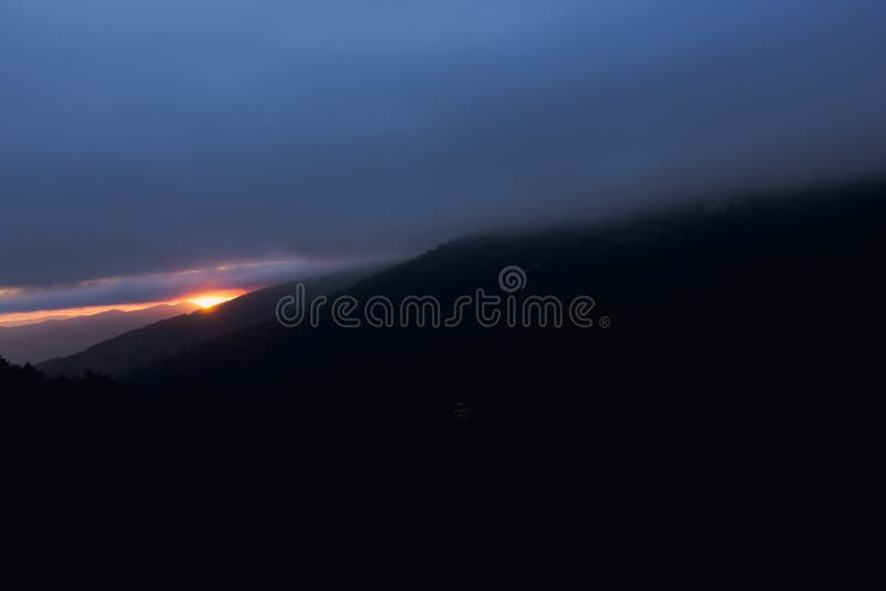 Stunning Sunset between Mountains Stock Photo - Image of color, outdoor ...
