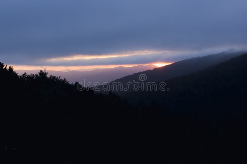 Stunning Sunset between Mountains Stock Image - Image of nature, color ...