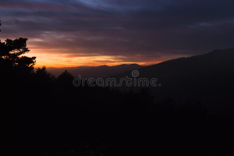 Stunning Sunset between Mountains Stock Image - Image of natural, land ...