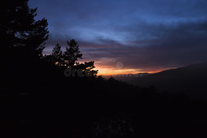 Stunning Sunset between Mountains Stock Photo - Image of country ...