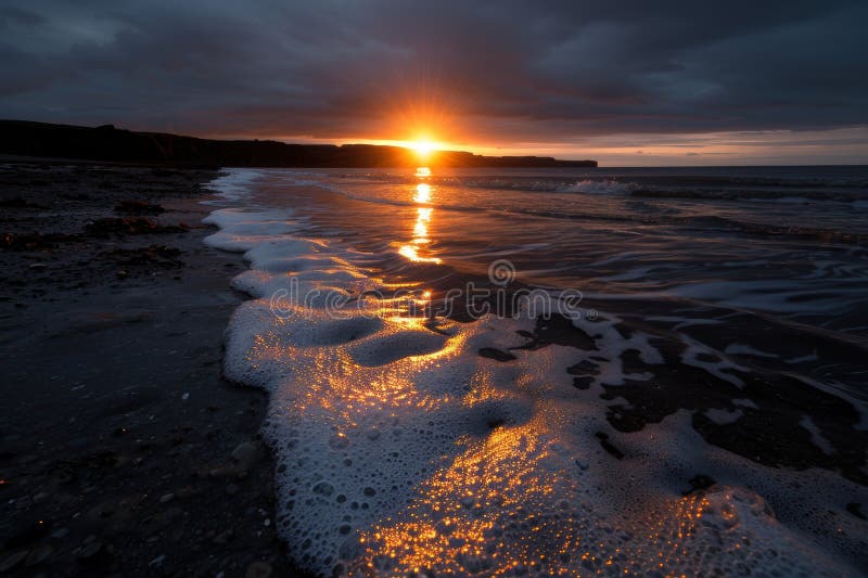 Stunning Sunset Over the Ocean with Dramatic Clouds and Glowing ...