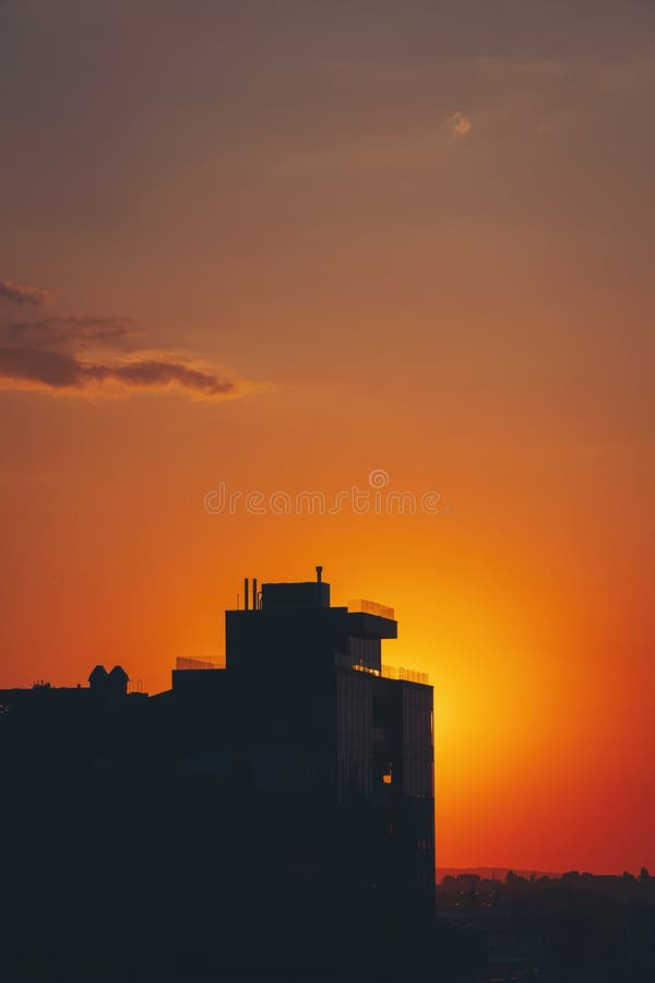 A Stunning Sunset Paints the Sky As the Sun Descends into Clouds with a ...