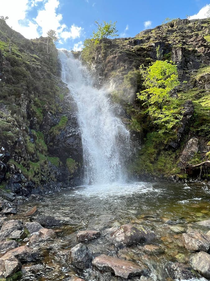 Stunning Vertical View of a Waterfall in the Lake District National ...