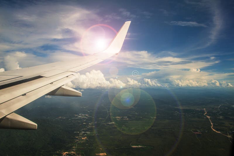 The Stunning View of an Airplane Wing in Flight with Shining Light ...