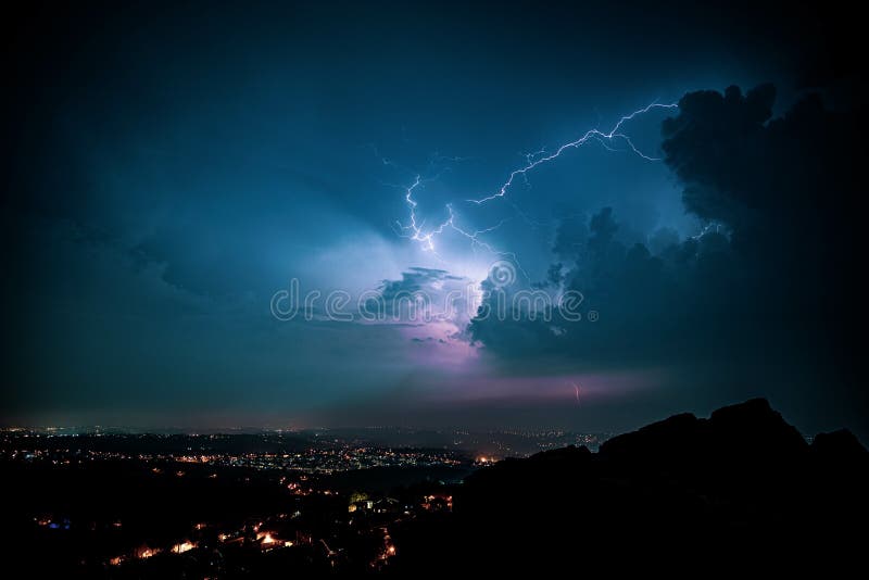 Stunning View of the Blue Lightning in the Night Sky Above the City ...