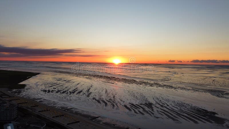 Stunning View of a Bright Vibrant Sunset Sky Over a Sea Stock Image ...