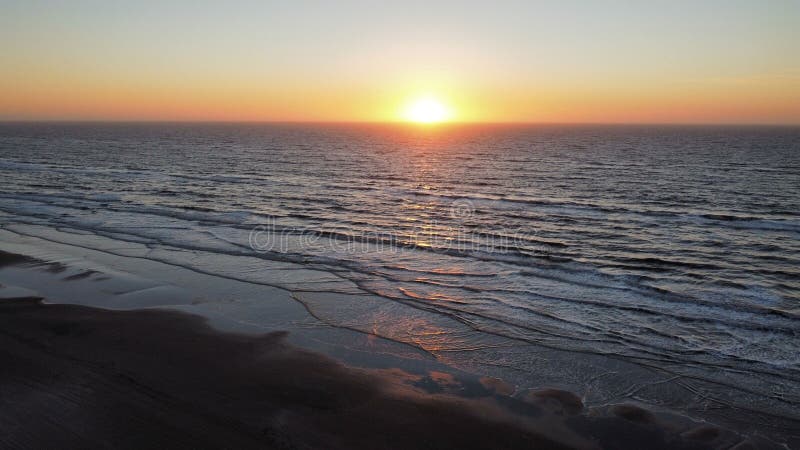 Stunning View of a Bright Vibrant Sunset Sky Over a Sea Stock Image ...