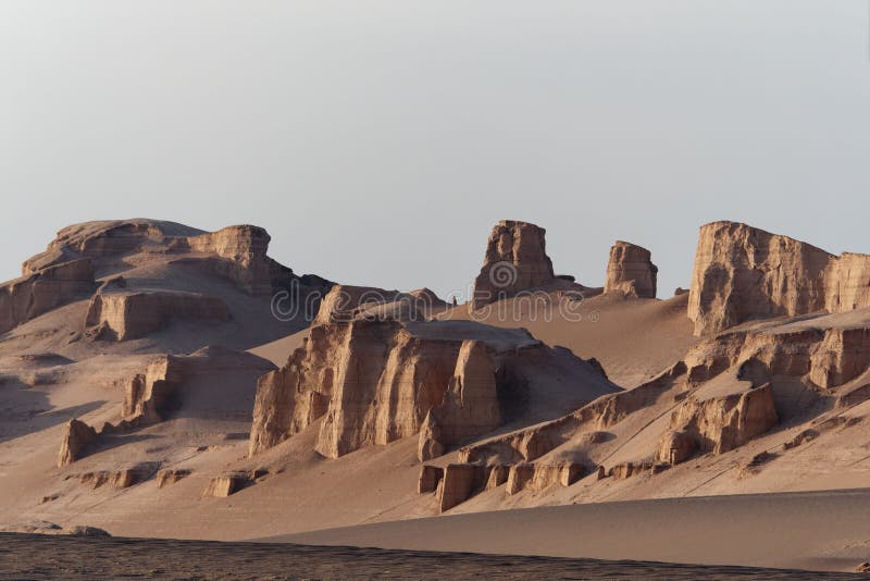 Stunning View of the Desert Featuring Several Mounds Surrounded by Sand ...