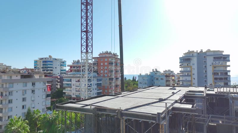 Aerial View: Professional Operator Assembles Crane Components, Scaling ...