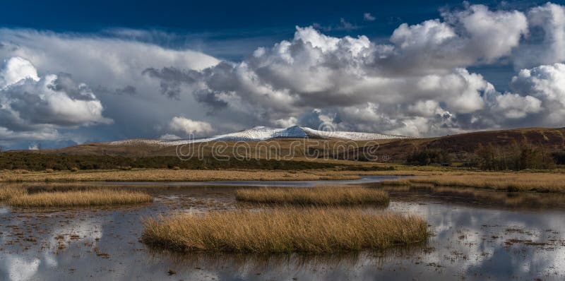 Stunning View of a Marsh with a Mountain Range, and Beautiful Low ...