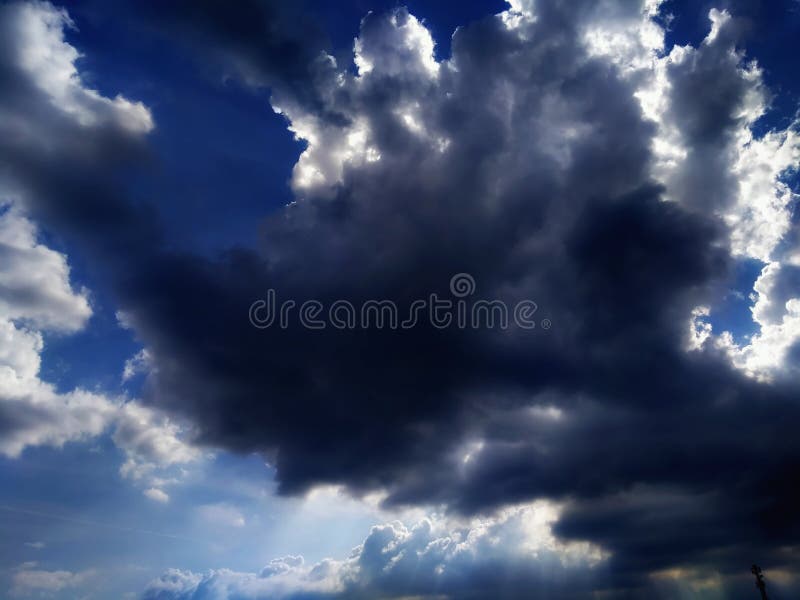 A Stunning View, White Clouds Hit by the Sun Against a Blue Sky. Stock ...