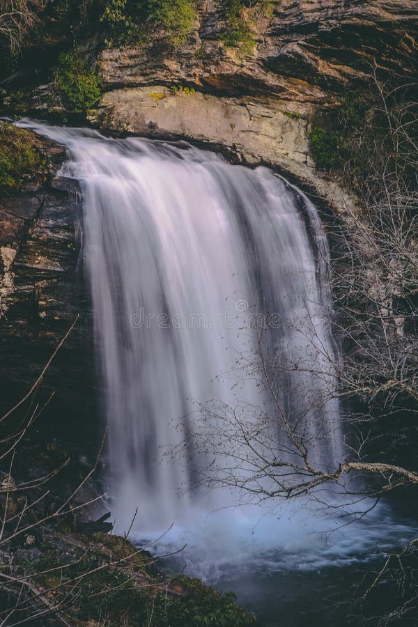 Stunning Waterfall Cascading Down the Side of a Mountain Stock Photo ...
