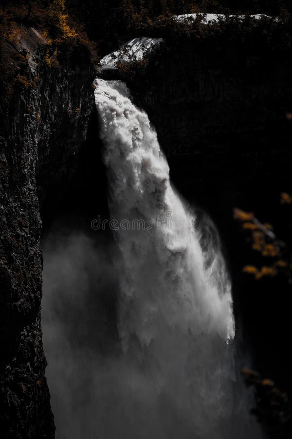 Stunning Waterfall Flowing into a River Stock Image - Image of autumn ...