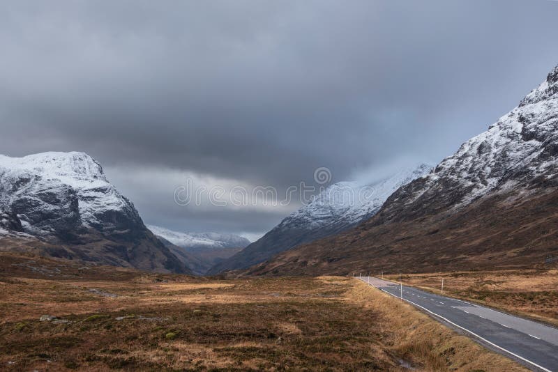 Stunning Winter Landscape Image of Snowcapped Three Sisters Mountain ...