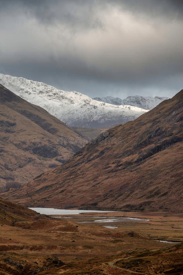 Stunning Winter Landscape Image of Snowcapped Three Sisters Mountain ...