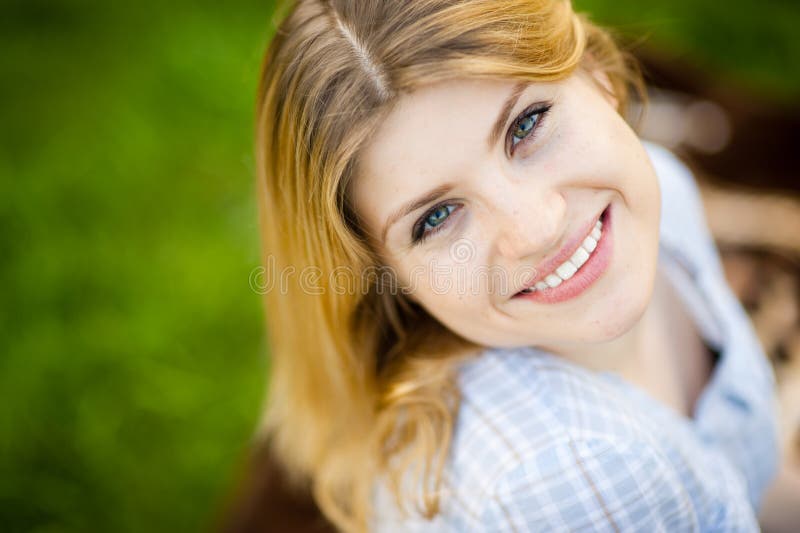 Stunning Woman Looks Back at the Camera with a Smile Stock Photo ...