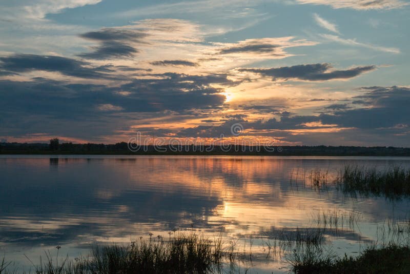 Stunningly Beautiful Sunset on a Pond without a Wind Stock Image ...