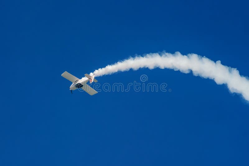 Stunt Aerobatic Plane Performing Stunts in Air Stock Photo - Image of ...