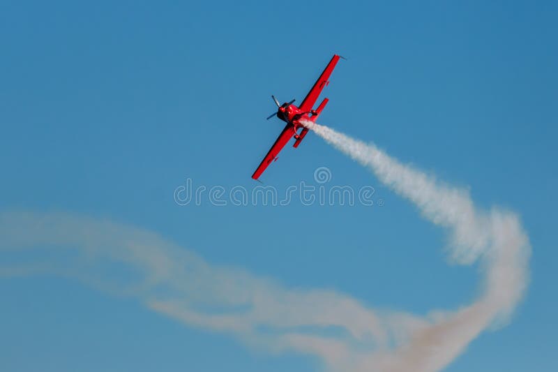 Stunt Aerobatic Plane Performing Stunts in Air Stock Image - Image of ...