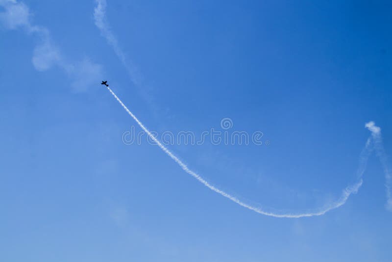 Stunt Plane Doing Loops Very Blue Sky with White Smoke Trail Stock ...