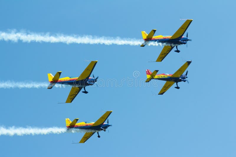 Stunt Plane Flying Against Clear Blue Sky. Editorial Photo - Image of ...