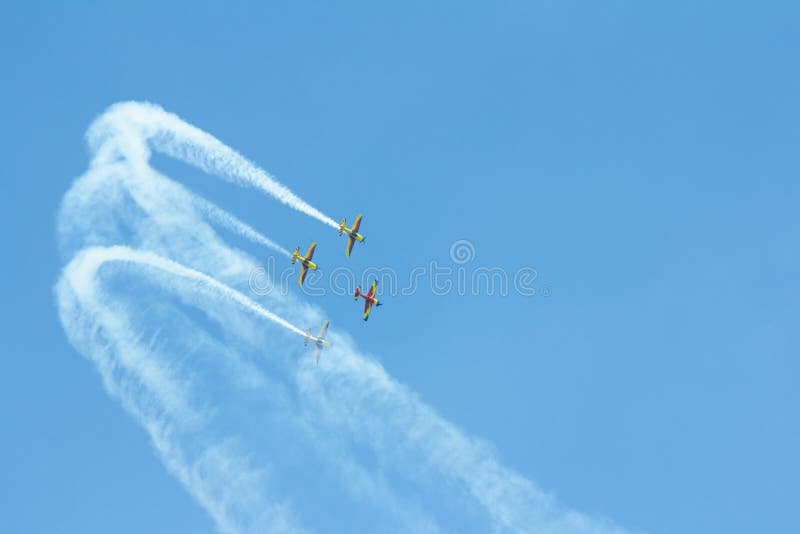 Stunt Plane Flying Against Clear Blue Sky. Editorial Stock Photo ...