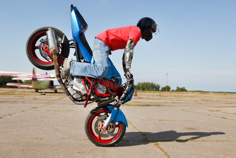 Stunt Rider Making Stoppie Royalty Free Stock Photos - Image: 11872788