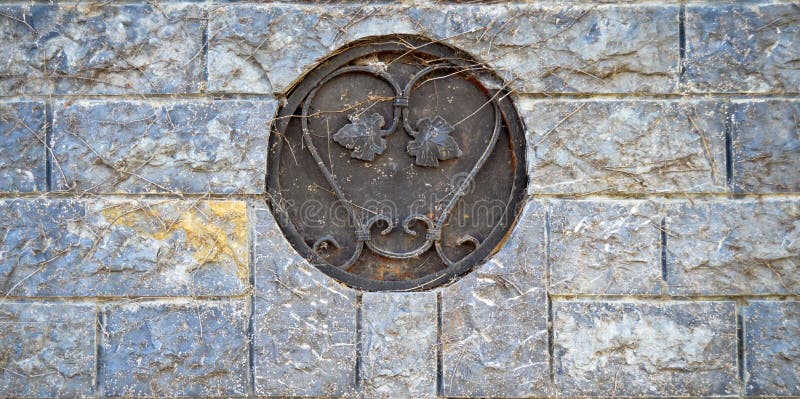 Sturdy Blue and Gray Cut Stone Wall, Wrought Iron Window Stock Image ...