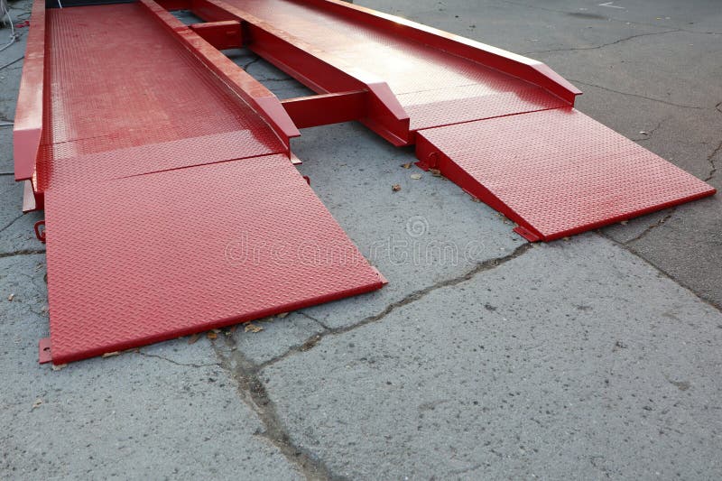 We Provide Industrial Red Loading Ramps for Efficient Vehicle Access ...