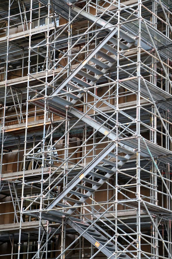 Sturdy Steel Staircase Winds through a Complex Grid of Scaffolding ...