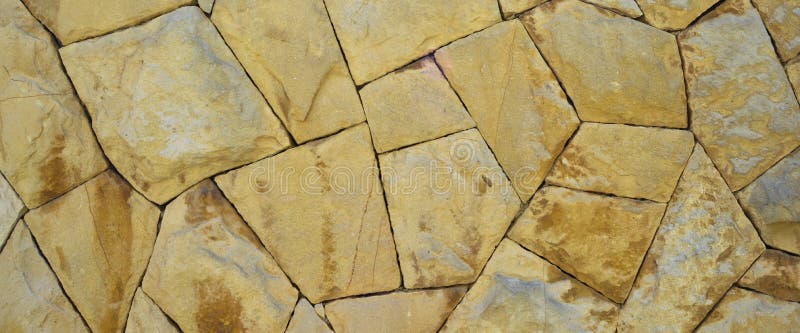Sturdy Yellow and Beige Cut Stone Wall, Seamless Lined Up Stock Image ...