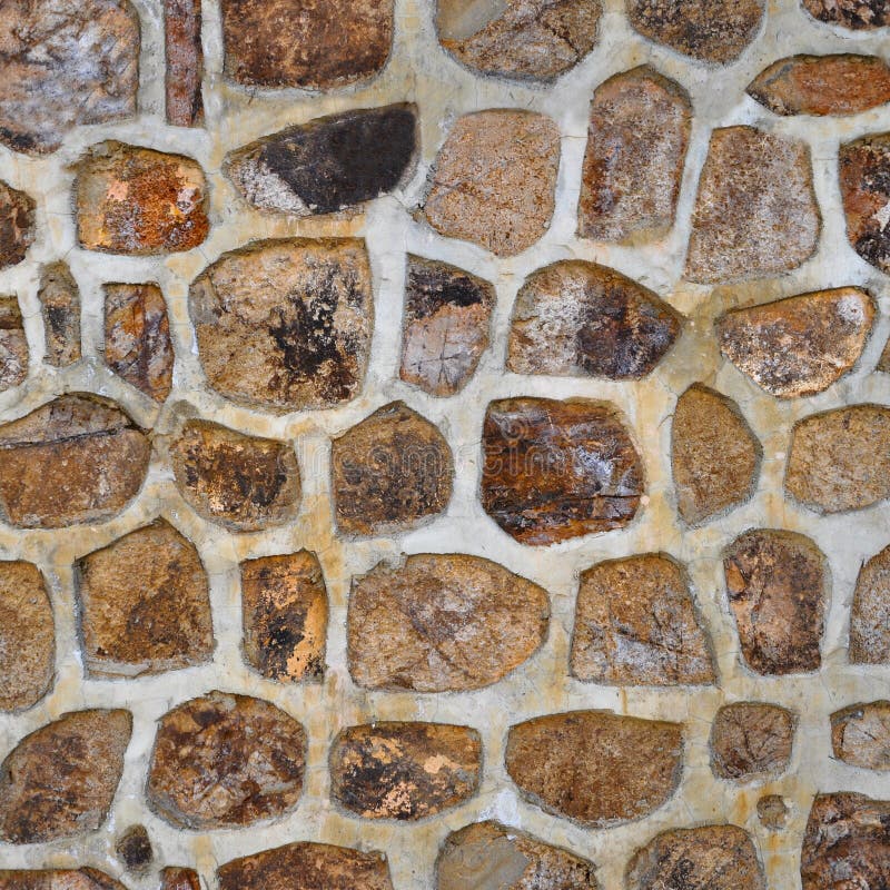 Sturdy Yellow and Beige Cut Stone Wall, Seamless Lined Up Stock Image ...