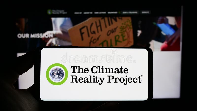 Person Holding Cellphone with Logo of Organization the Climate Reality ...