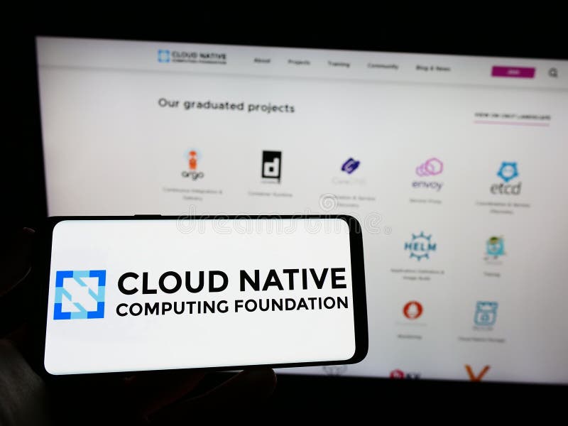Person Holding Mobile Phone with Logo of Cloud Native Computing ...