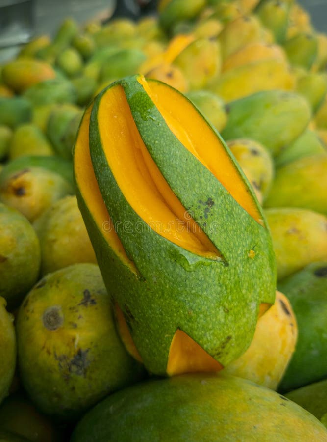 Styled Cut Mango Middle of Many Mangos Stock Photo - Image of fruit ...