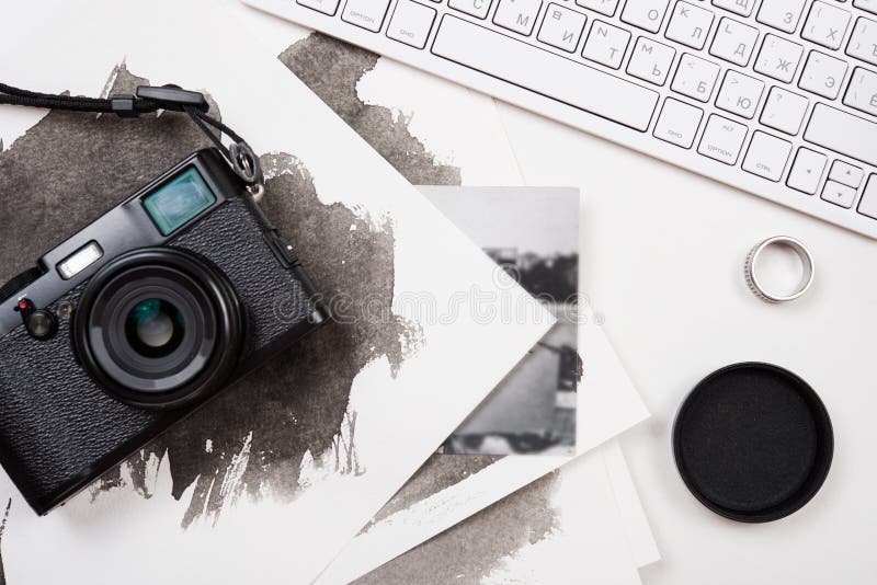 Styled Tabletop with Computer Keyboard and Retro Camera on White Stock ...