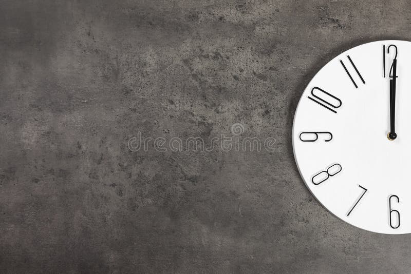 Stylish Analog Clock Hanging on Grey Wall, Space for Text Stock Image ...